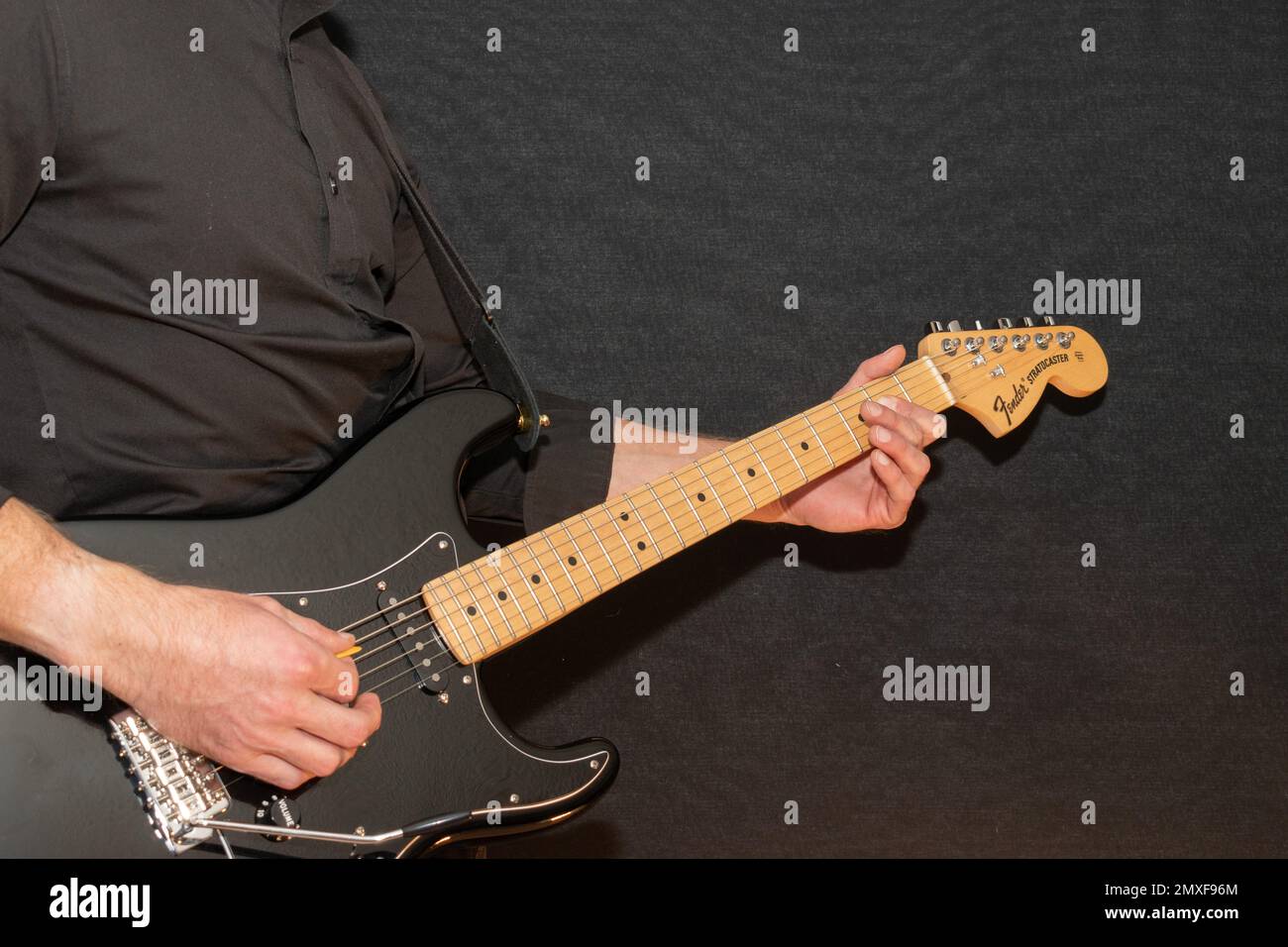 Vaduz, Liechtenstein, December 23, 2022 Artist is performing with a ...