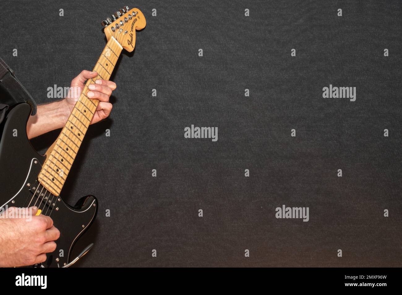 Vaduz, Liechtenstein, December 23, 2022 Artist is performing with a ...