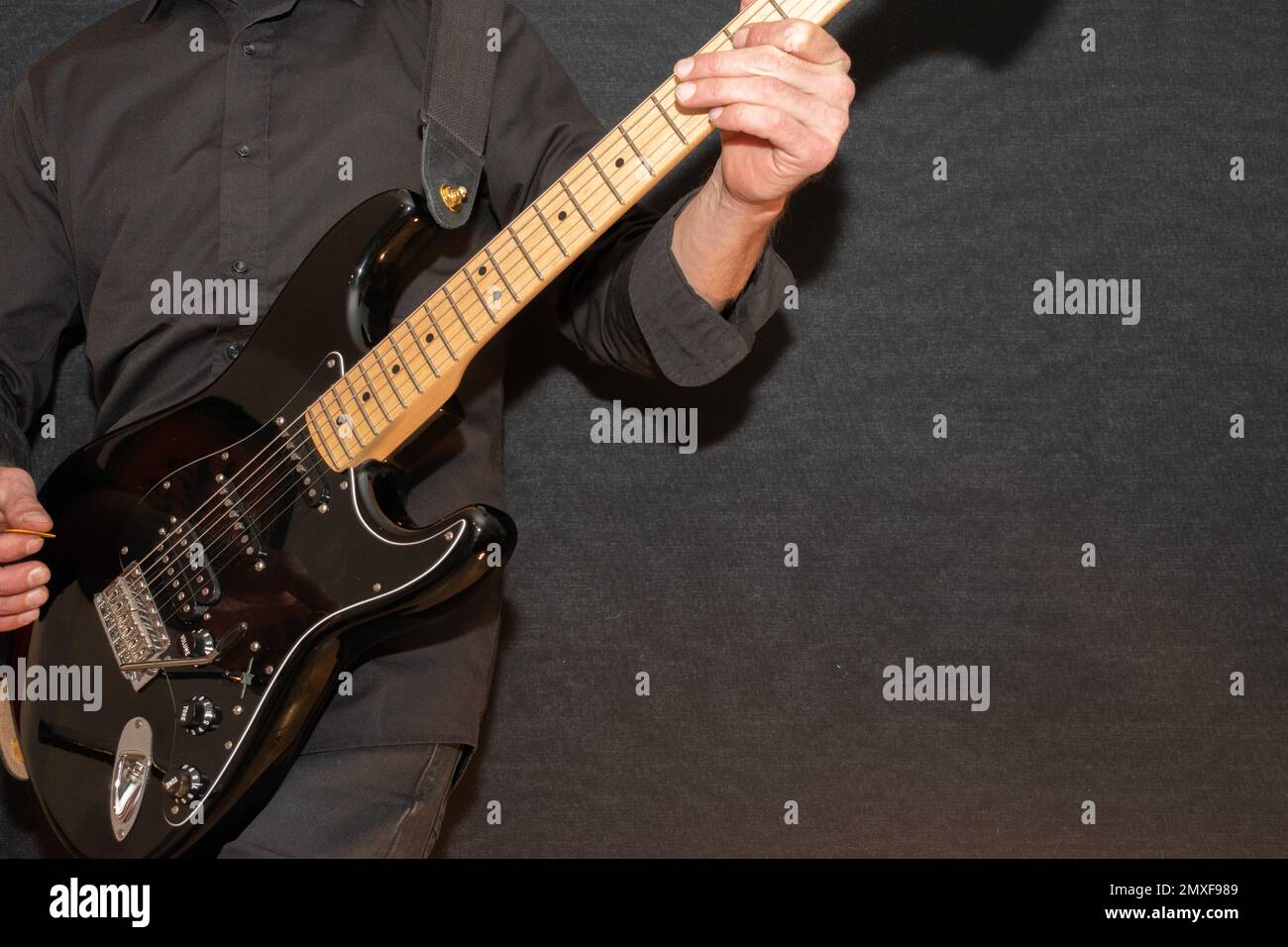 Vaduz, Liechtenstein, December 23, 2022 Artist is performing with a ...