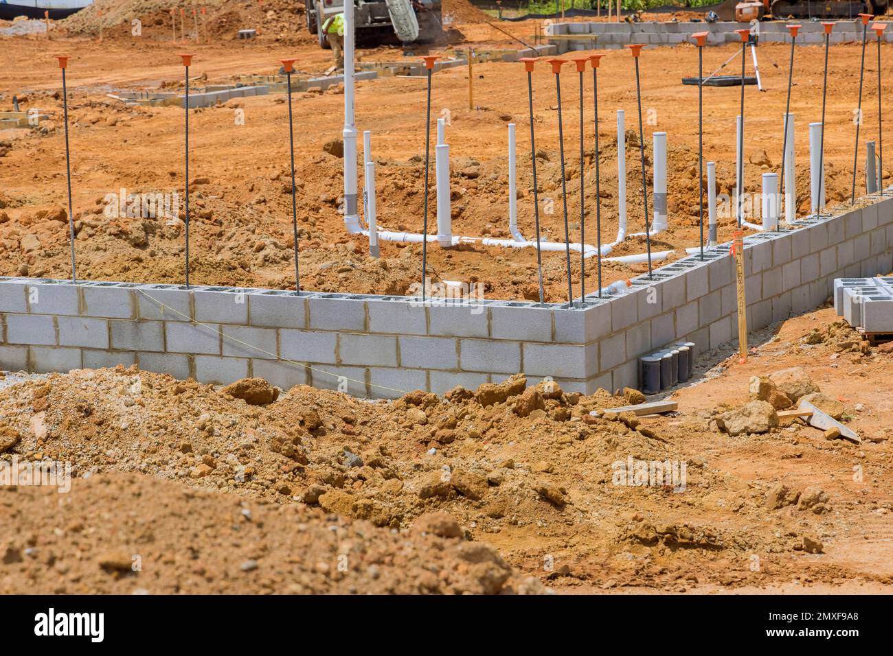 On construction site at moment, there is stack of cement blocks that ...