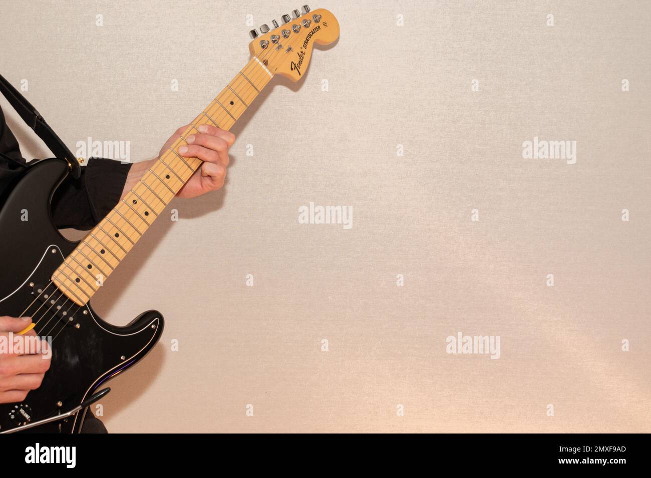 Vaduz, Liechtenstein, December 23, 2022 Artist is performing with a ...