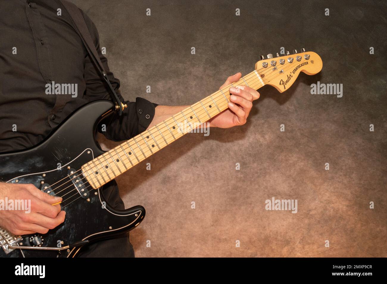 Vaduz, Liechtenstein, December 23, 2022 Artist is performing with a ...