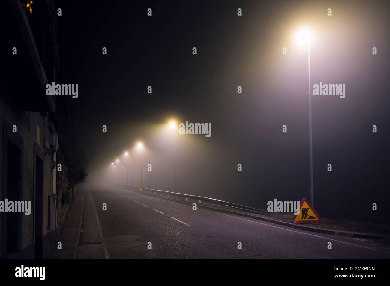 Moonless night on the edge of a village in rural Spain illuminated with ...
