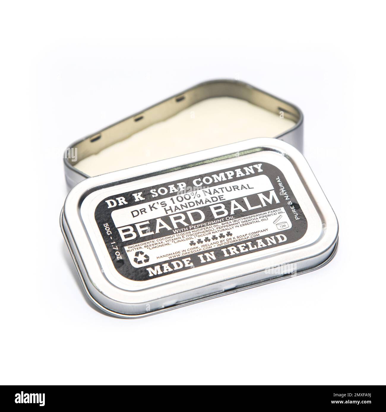 A beard balm in a container on white background Stock Photo - Alamy