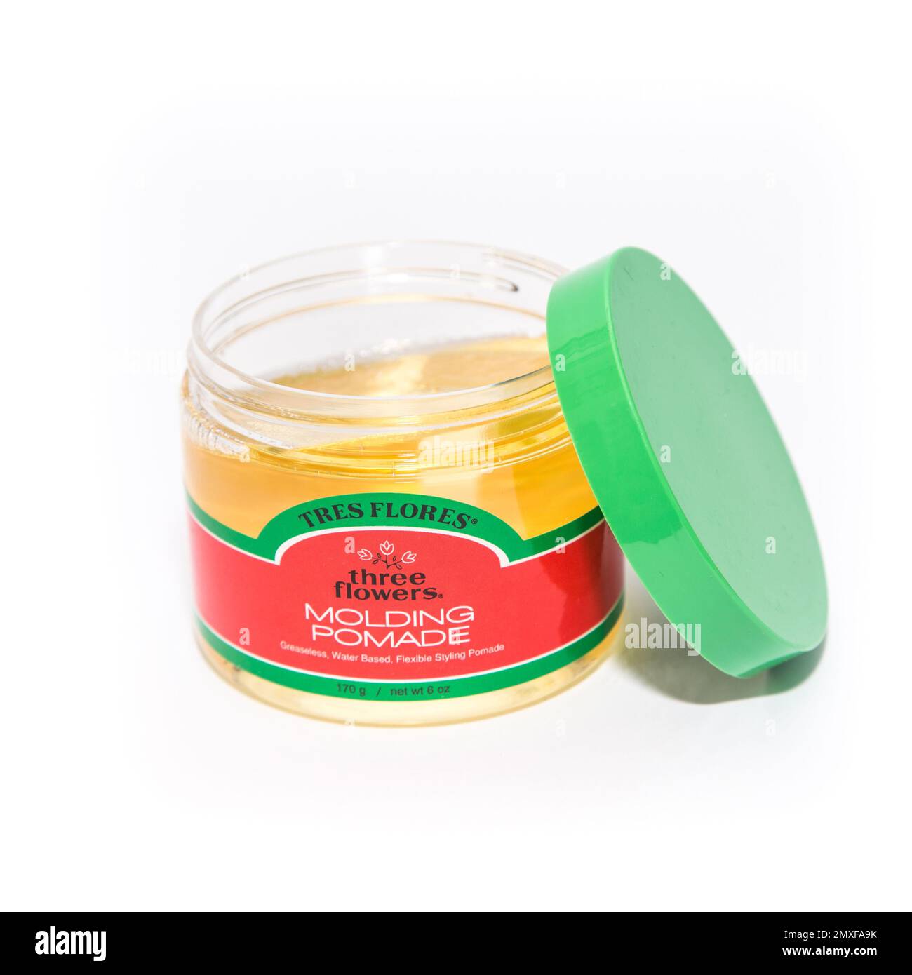 A beard and hair balm in a container on white background Stock Photo ...