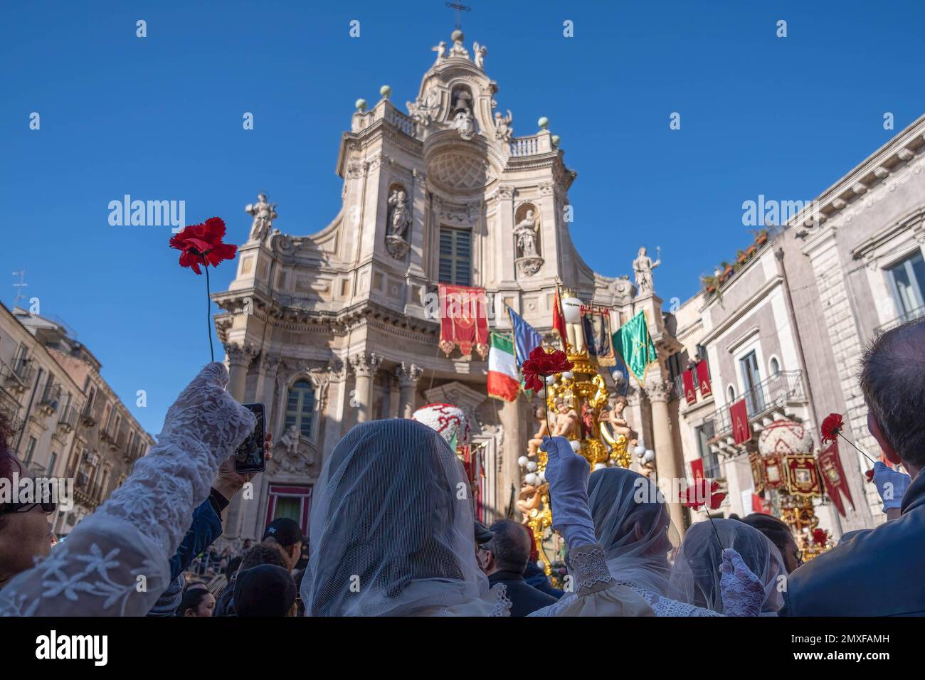 The traditional Candeloras seen standing among the crowd of people in ...