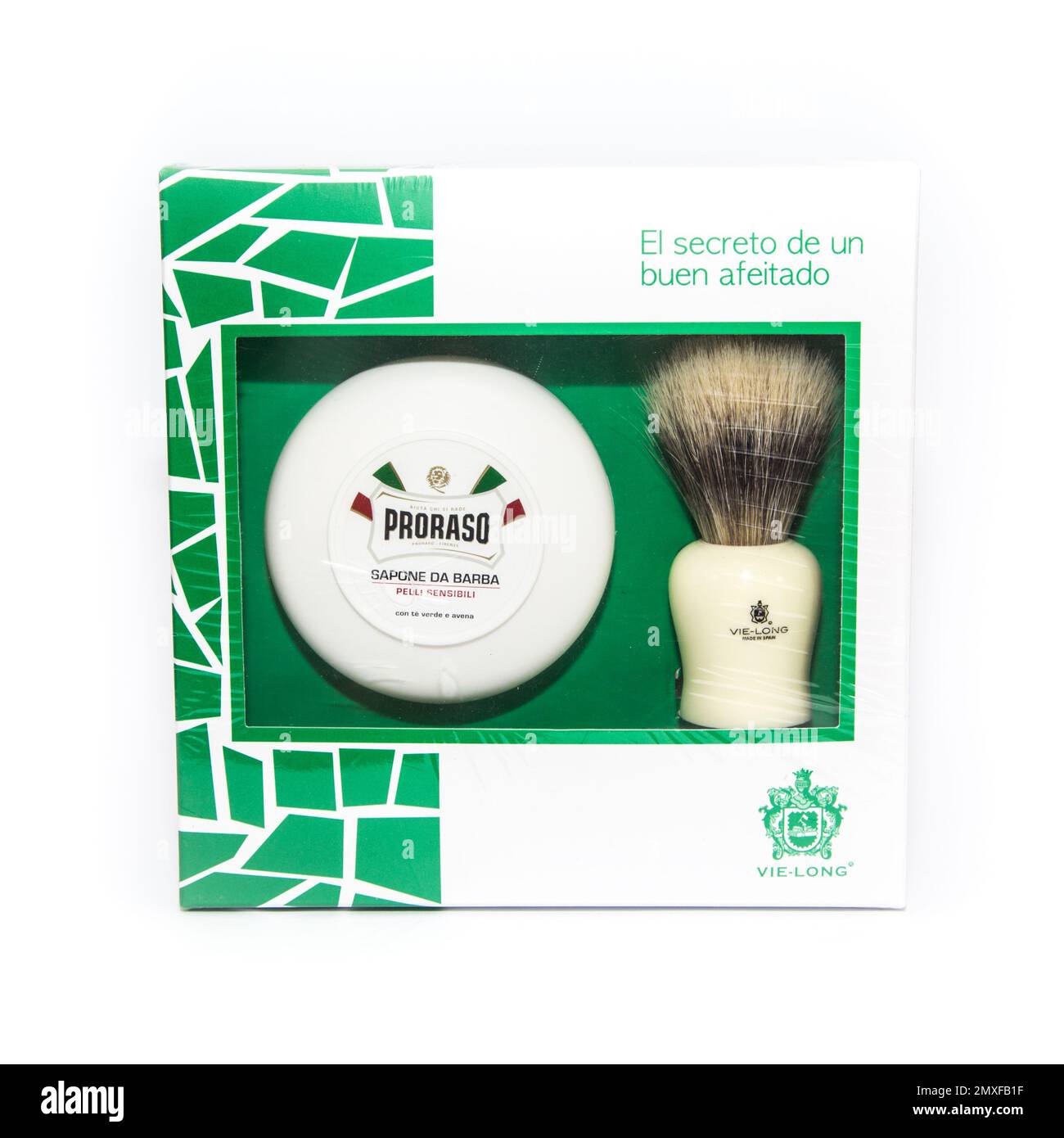A green box of sensitive skin shaving soap and brush with the text ...