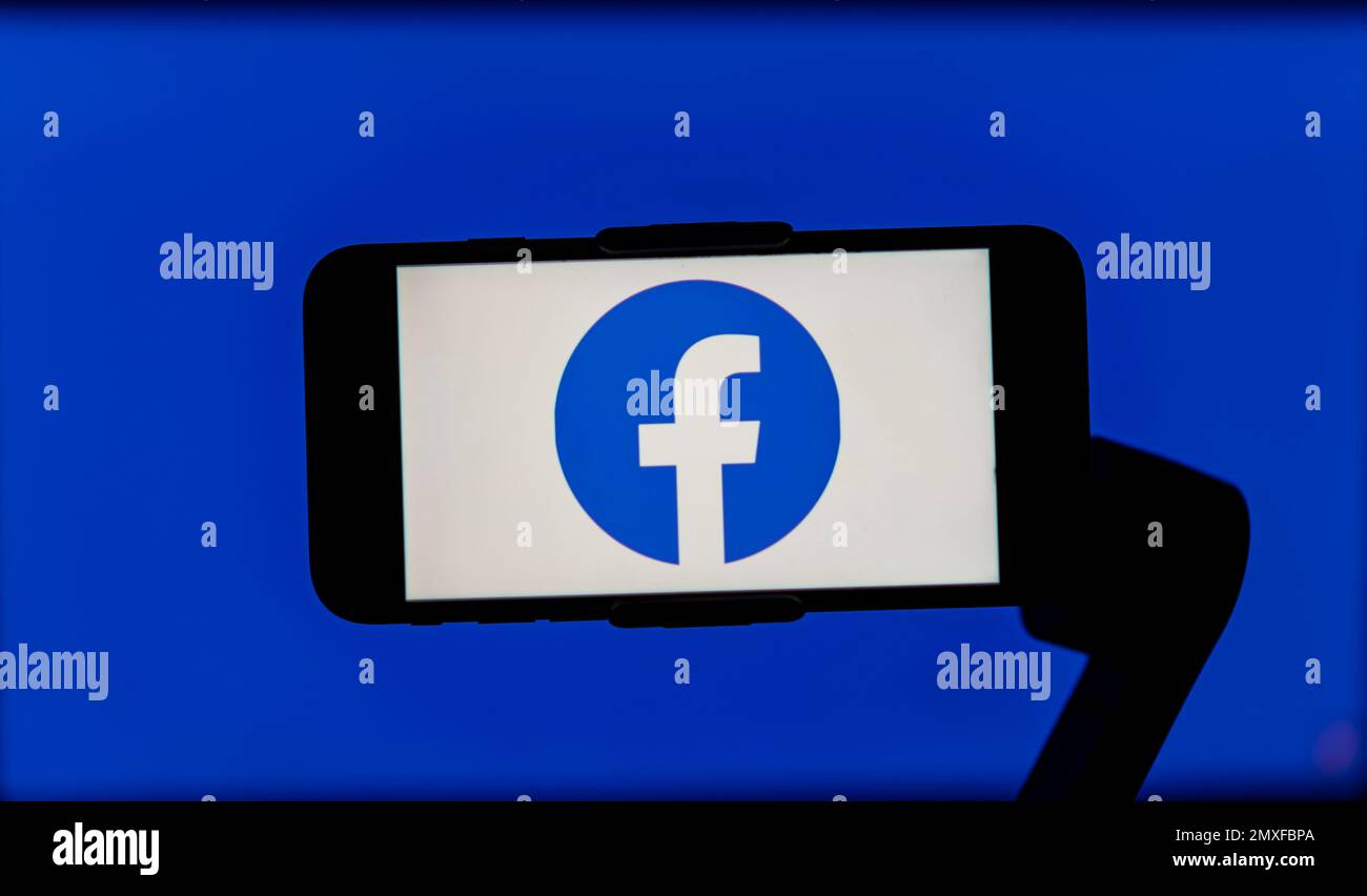 In this photo illustration, the Facebook logo is seen displayed on a ...