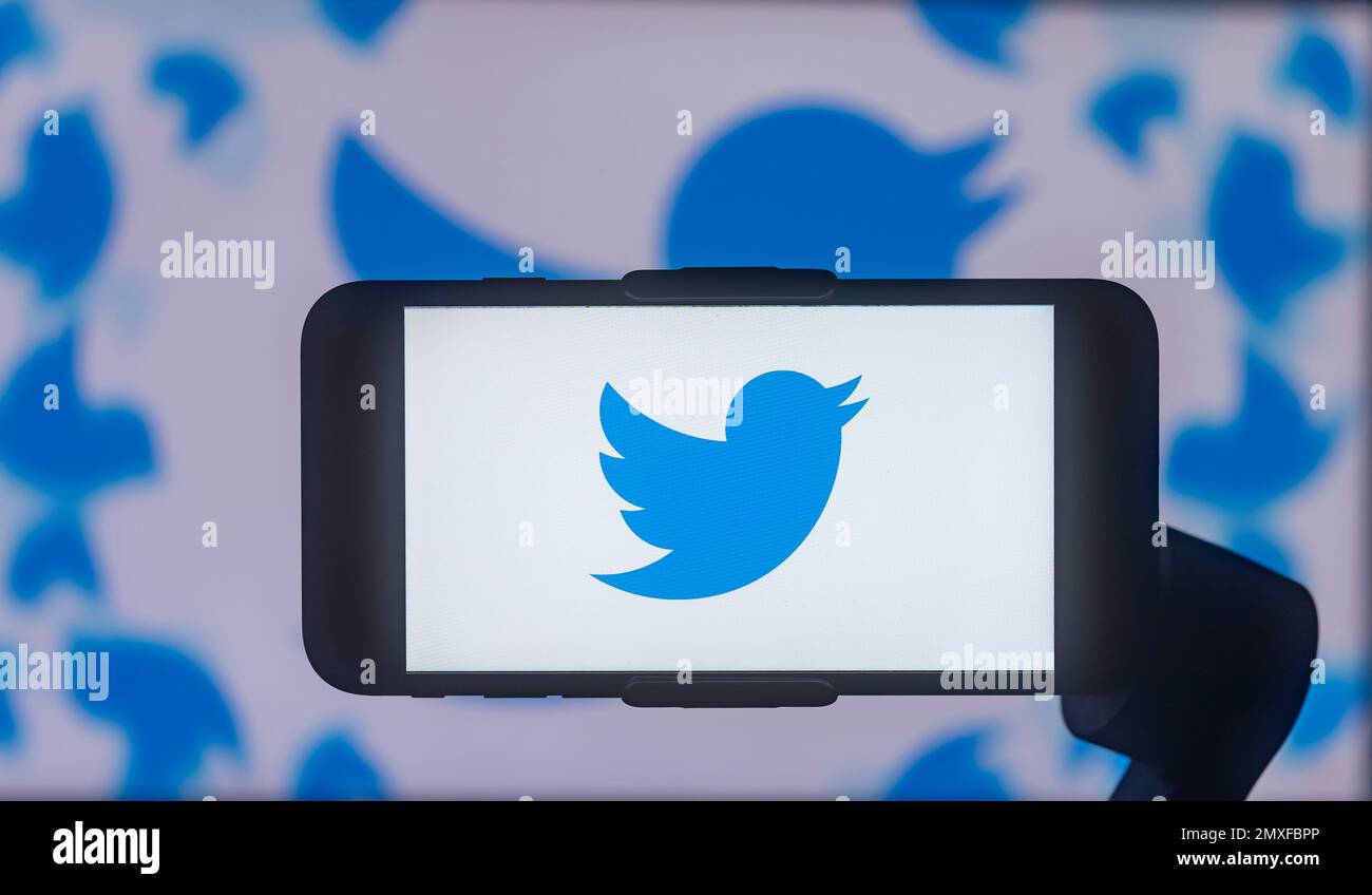 In this photo illustration, the Twitter logo is seen displayed on a ...