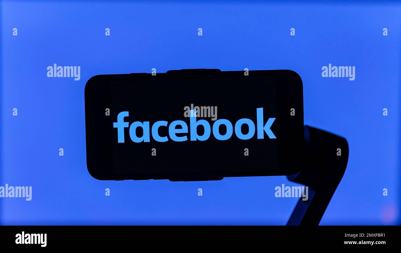 In this photo illustration, the Facebook logo is seen displayed on a ...