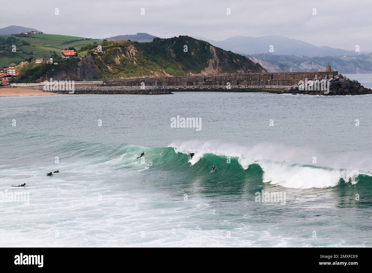 An aerial view of a group of surfers in the ocean on the Cote Basque ...