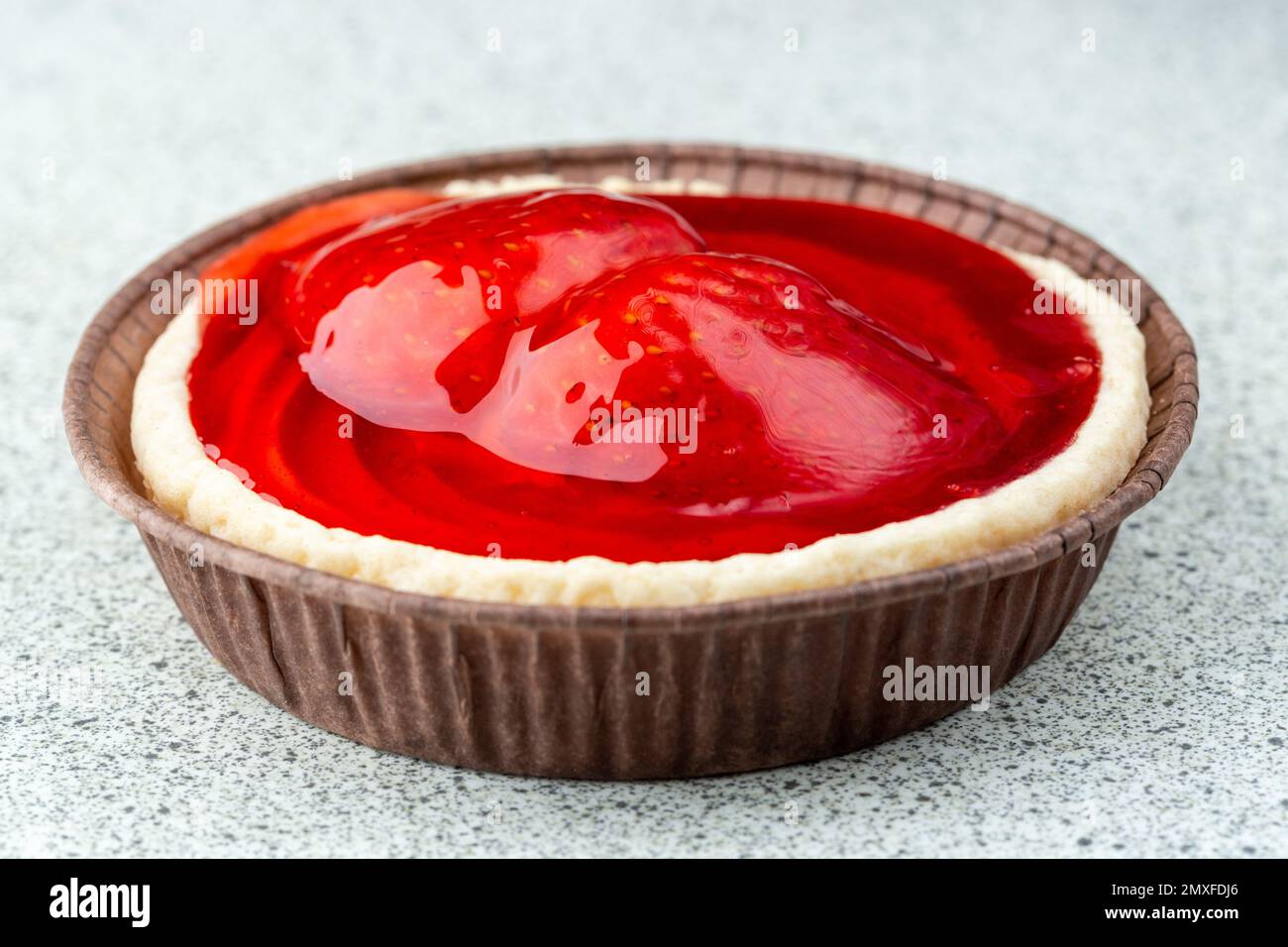 A close up of a bright red strawberry tart Stock Photo - Alamy