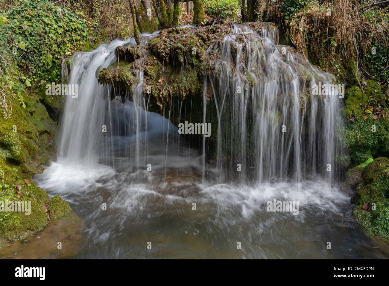 Water flow over tufa rock and makes small waterfall on Una river in Una ...