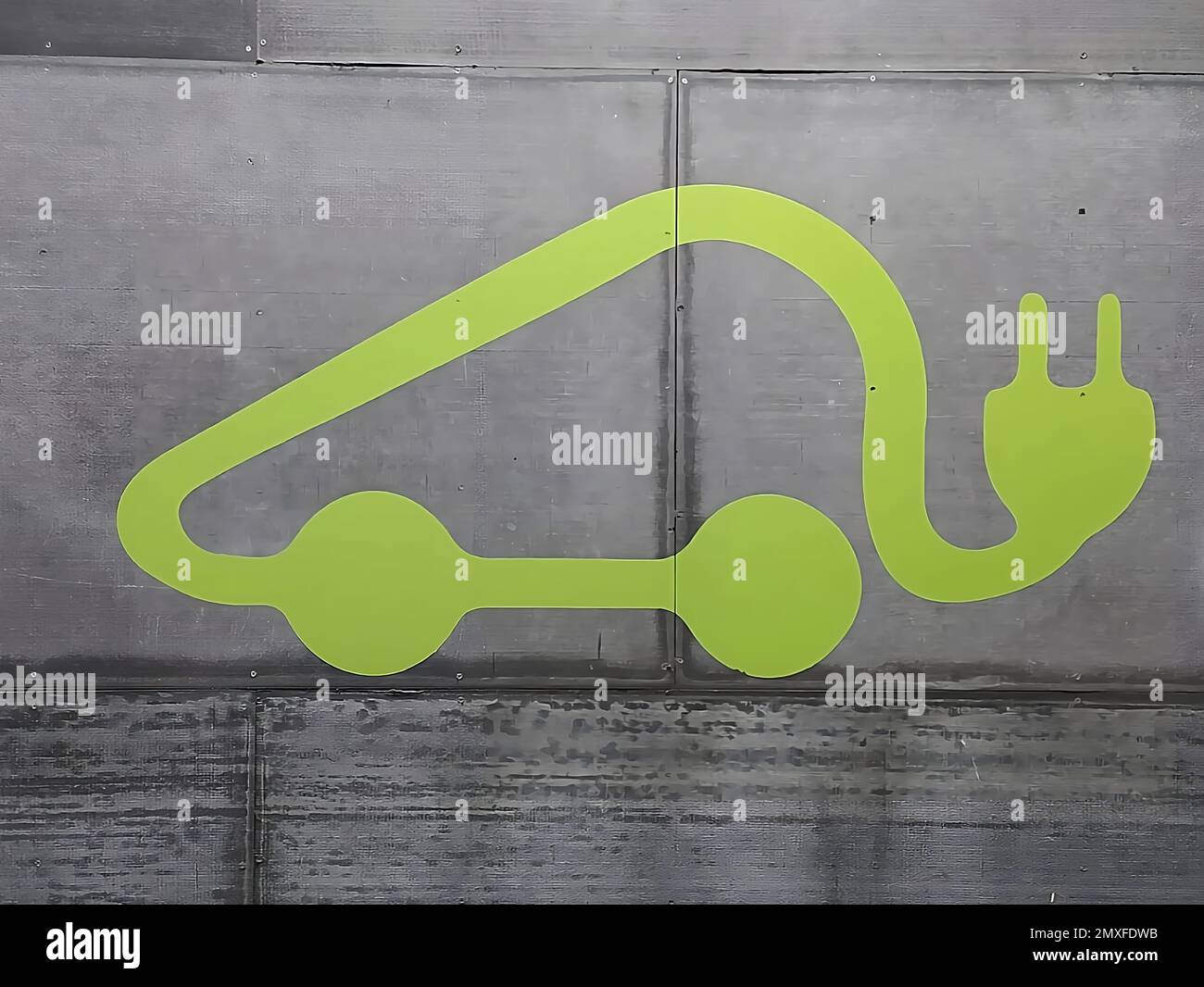 Electric car charging symbol in a parking lot Stock Photo - Alamy