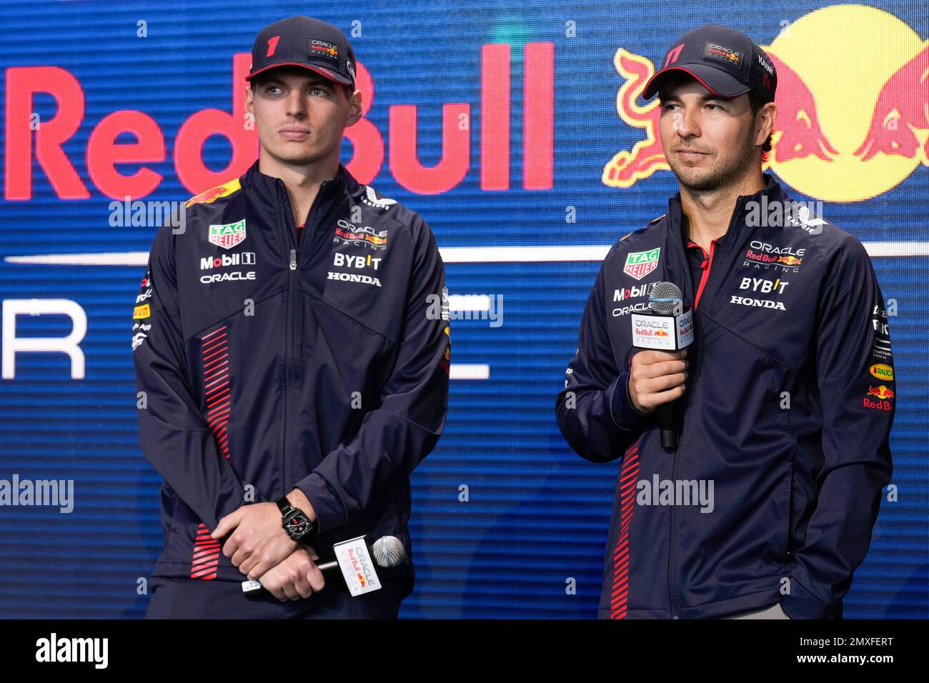 Red Bull Racing drivers Max Verstappen, left, and Sergio Perez ...