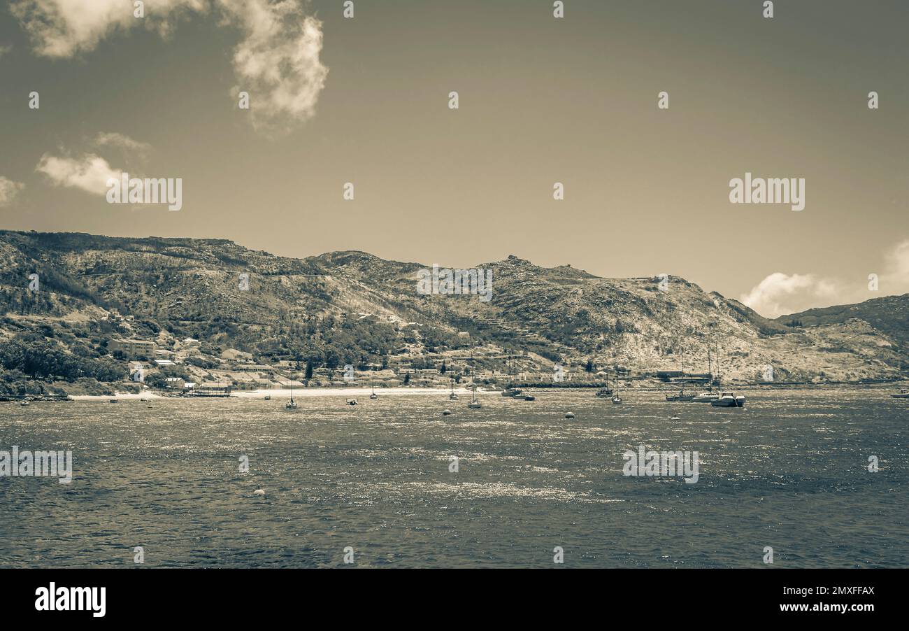False Bay coast landscape with boulders beaches waves and mountains in ...