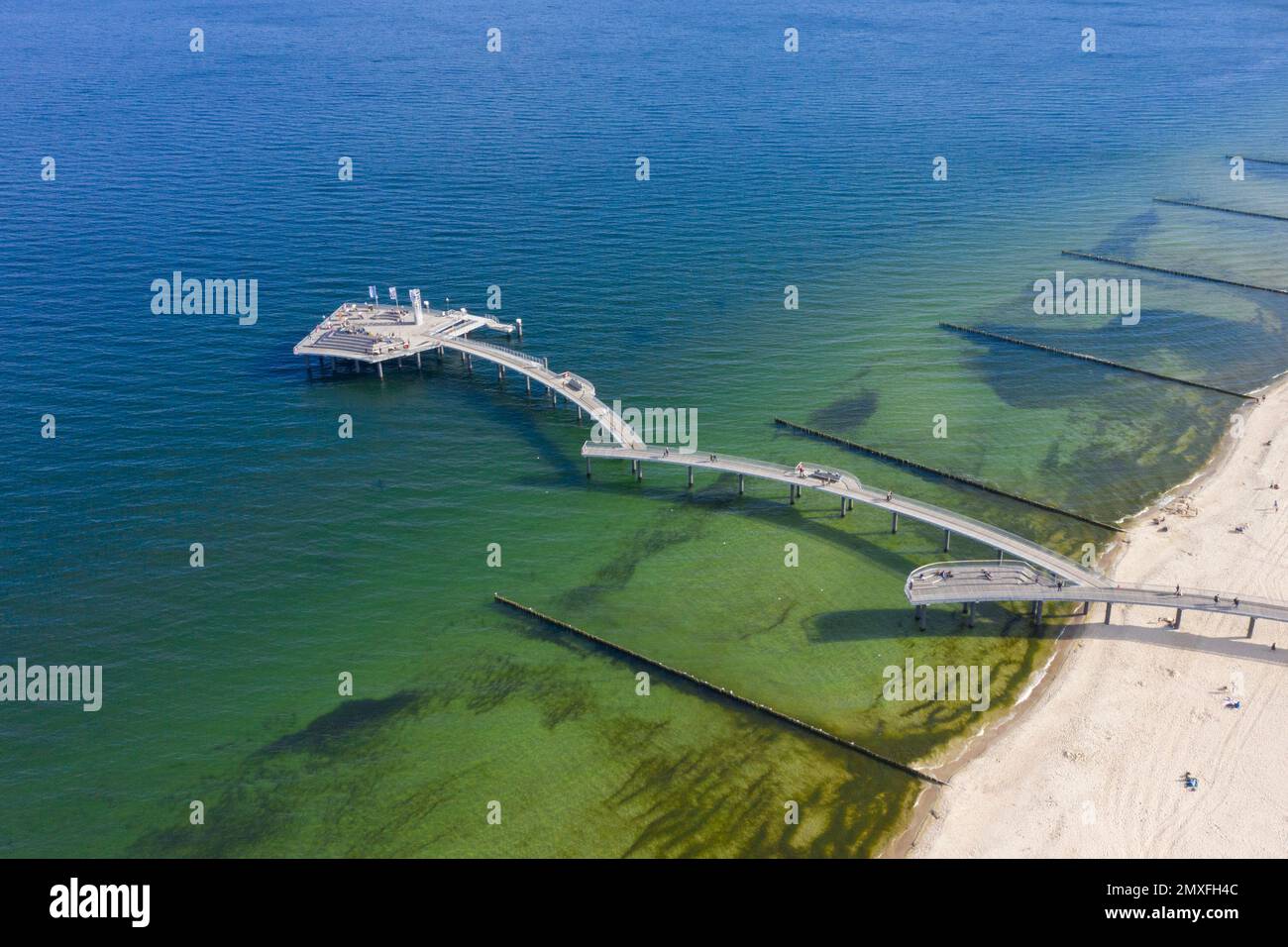 Aerial view over Koserow Pier / Seebrücke and Amber Beach on Usedom ...
