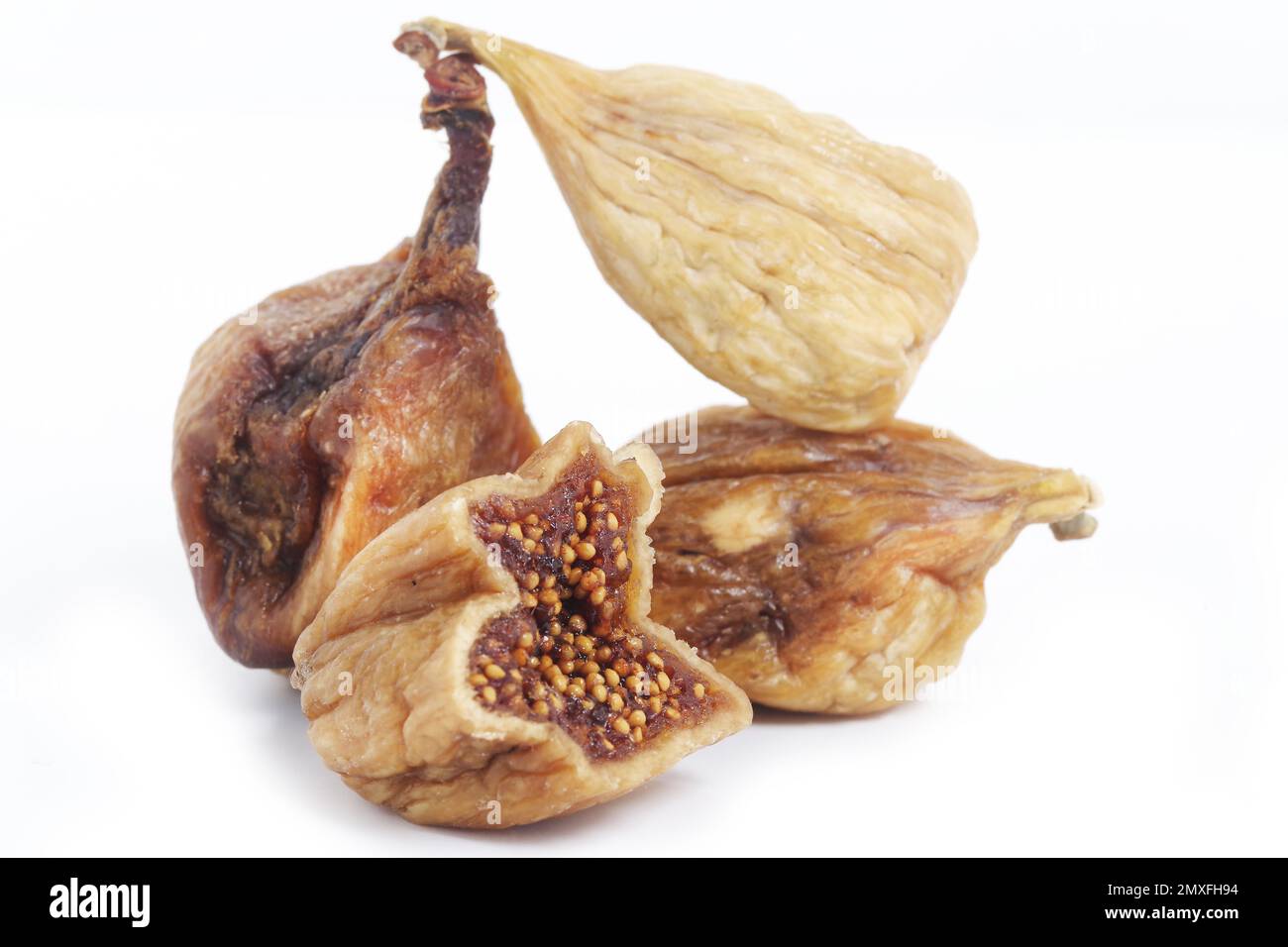 Naturally sweet dried figs in the white background. Healthy ...