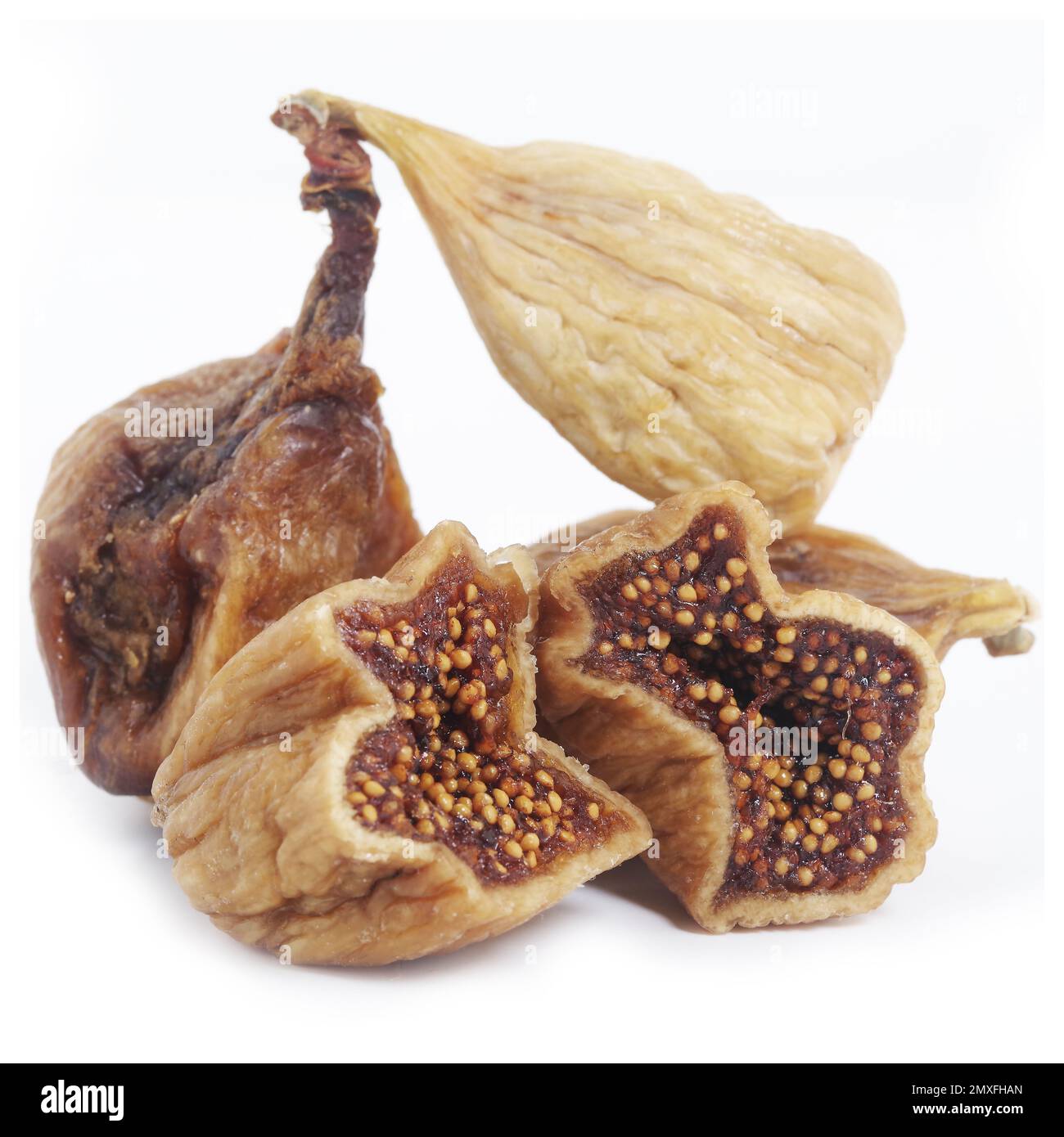 Naturally sweet dried figs in the white background. Healthy ...