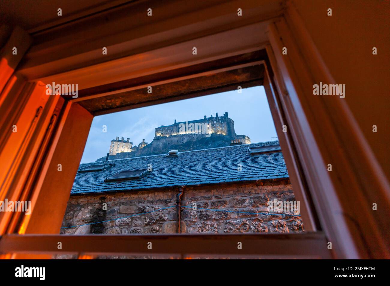 View through a window to the castle of Edingburgh, Scotland Stock Photo ...