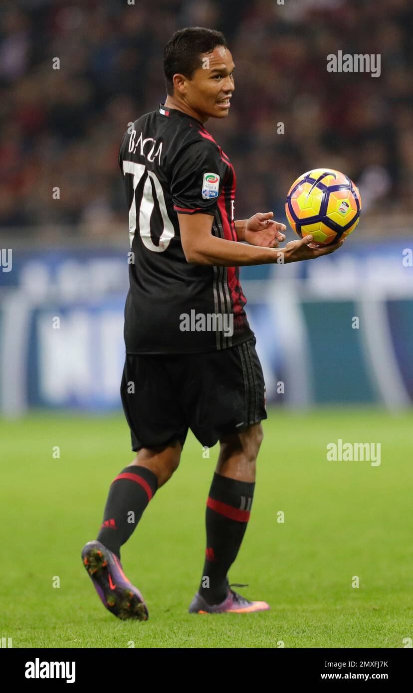 AC Milan’s Carlos Bacca holds the ball during a Serie A soccer match ...