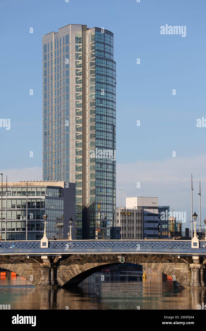 Modern tall high-rise glass-fronted apartment block on Belfast skyline ...