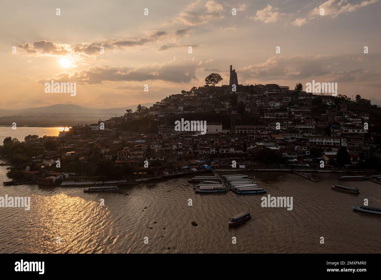 A charming view of Janitzio island and lake Patzcuaro at sunset, Mexico ...