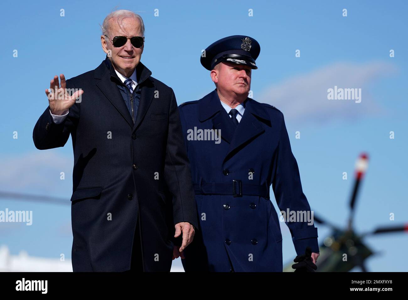 President Joe Biden walks from Marine One with Col. Matthew Jones ...
