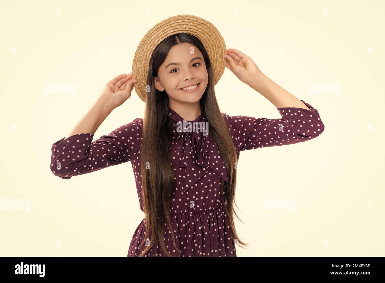 Portrait of happy smiling teenage child girl. Pretty teenage girl in white studio background ...