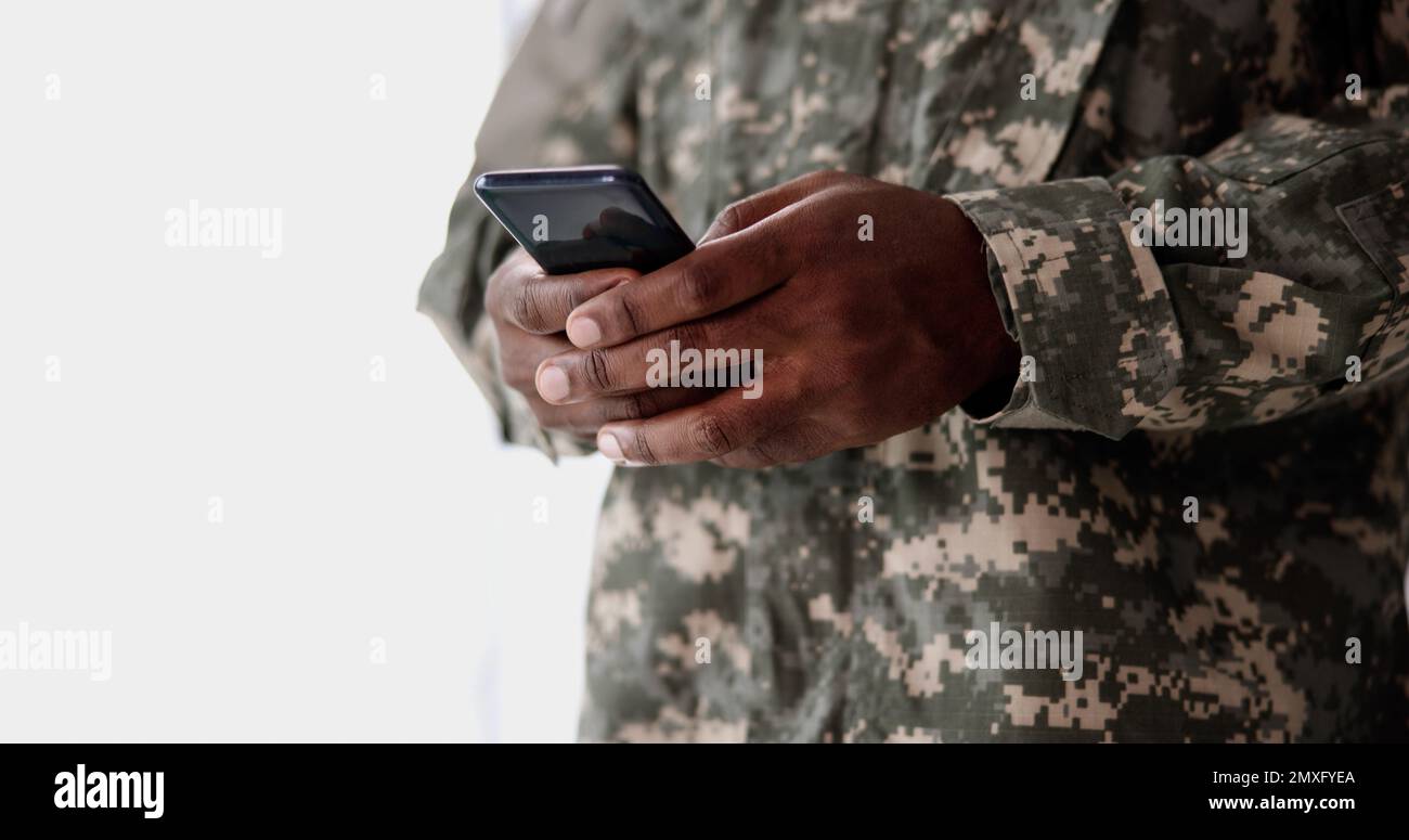 US Military Soldier Smart Phone Espionage. Cyber War Stock Photo - Alamy