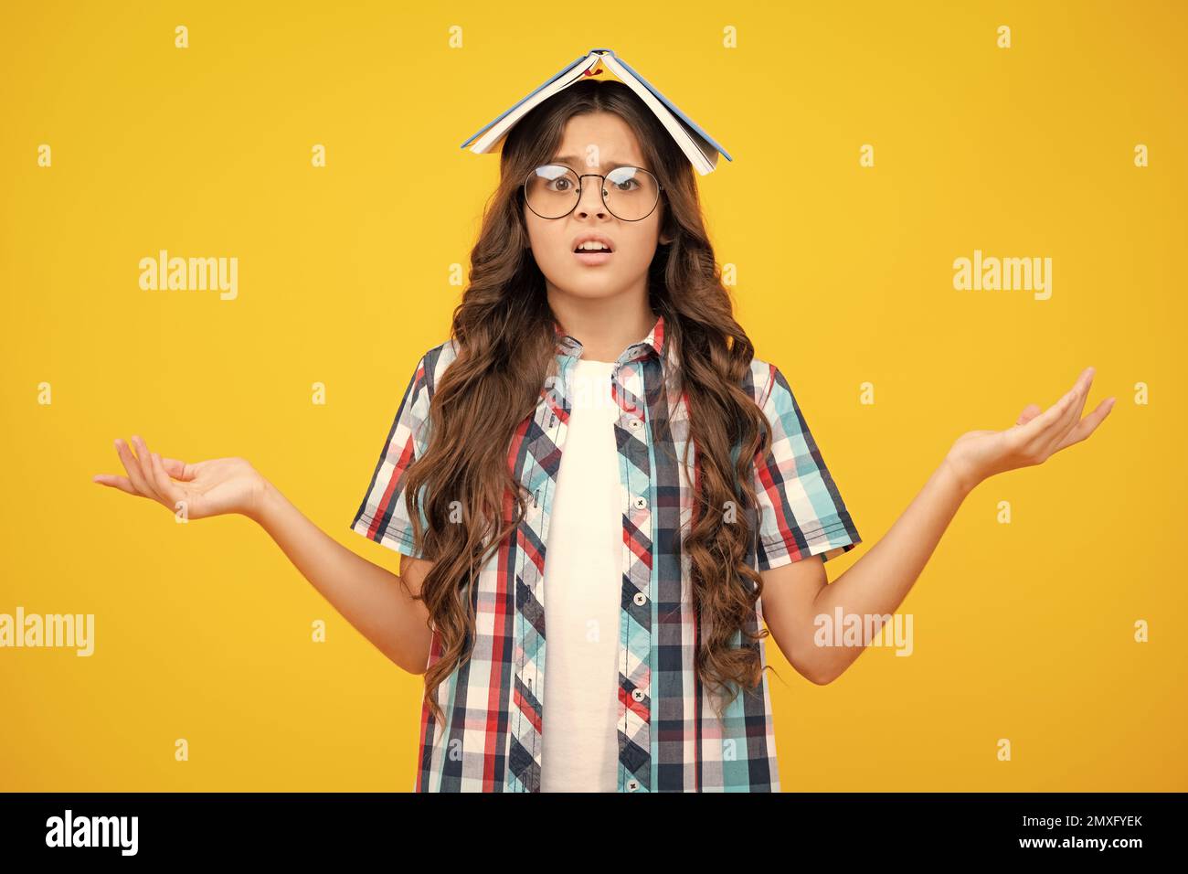 Teenage school girl with books. Schoolgirl student. Shocked surprised ...