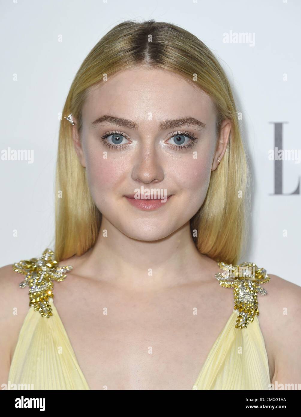 Dakota Fanning arrives at the 23rd annual ELLE Women in Hollywood ...