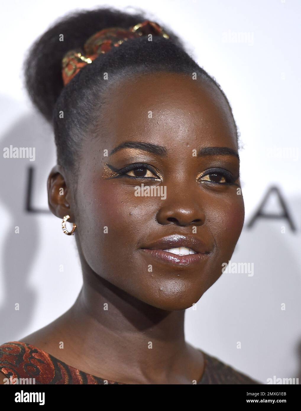 Lupita Nyong'o arrives at the 23rd annual ELLE Women in Hollywood ...