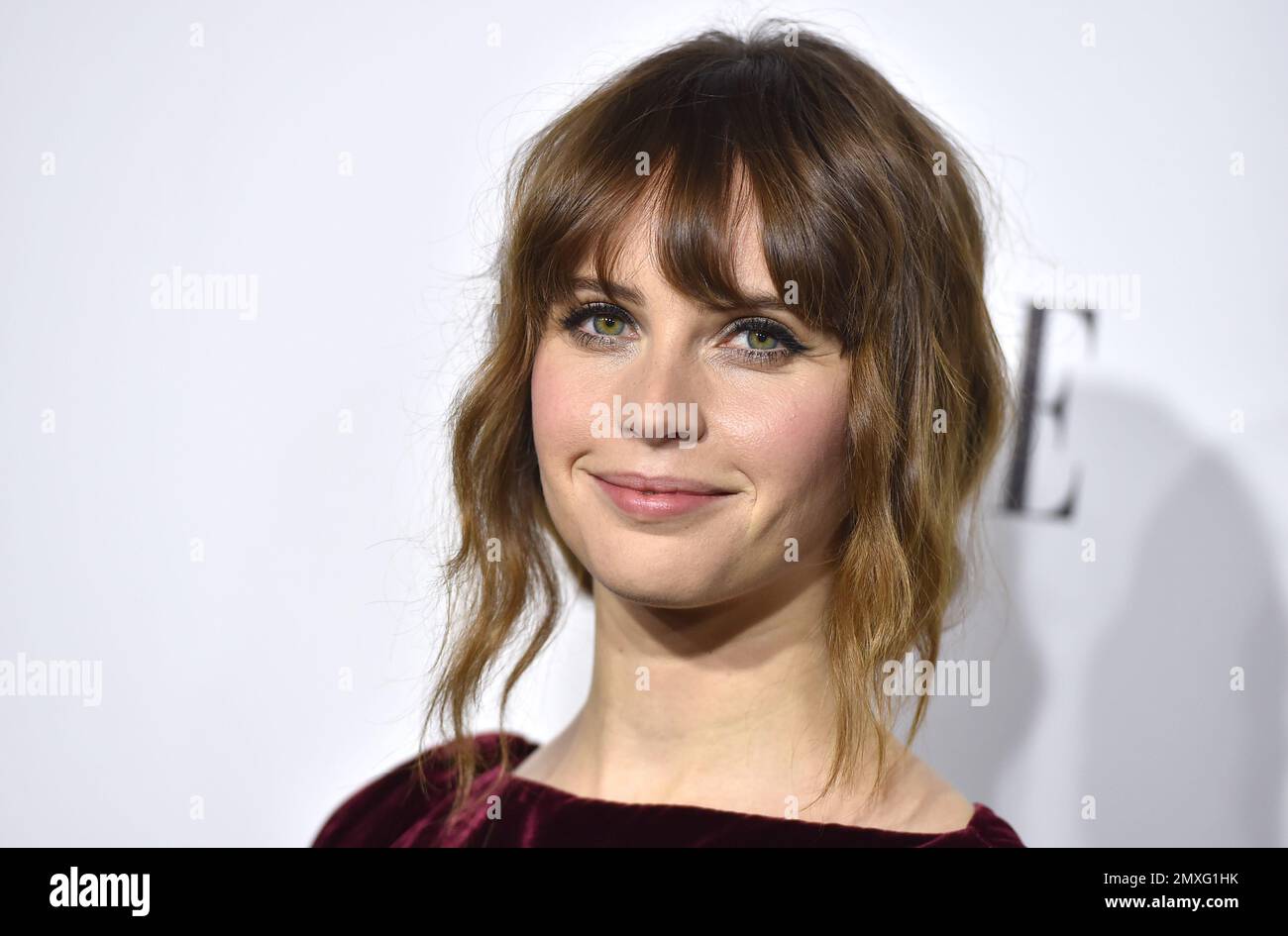 Felicity Jones arrives at the 23rd annual ELLE Women in Hollywood ...