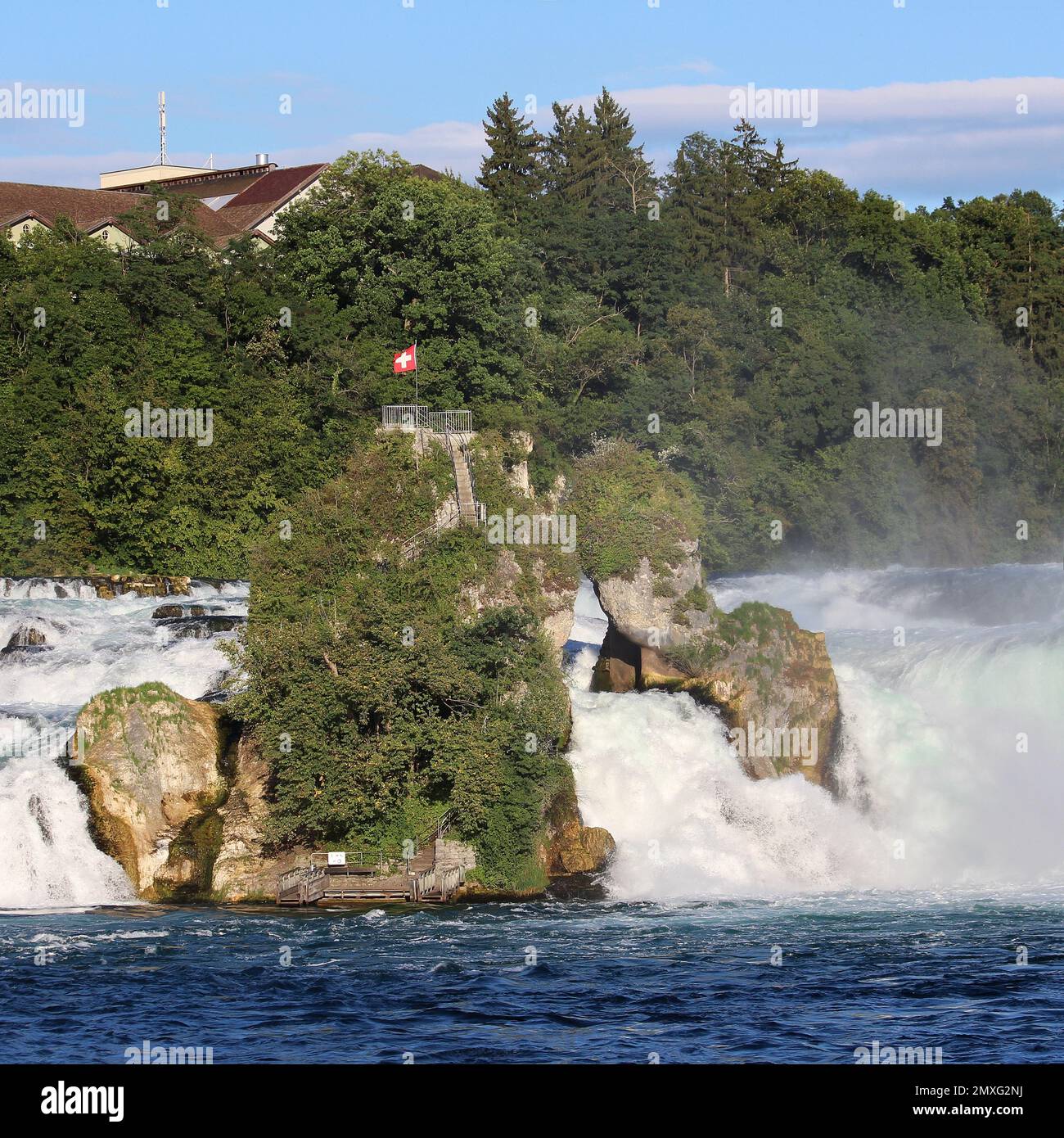 Rock on the biggest waterfall in Europe - Rhinefalls in Switzerland ...