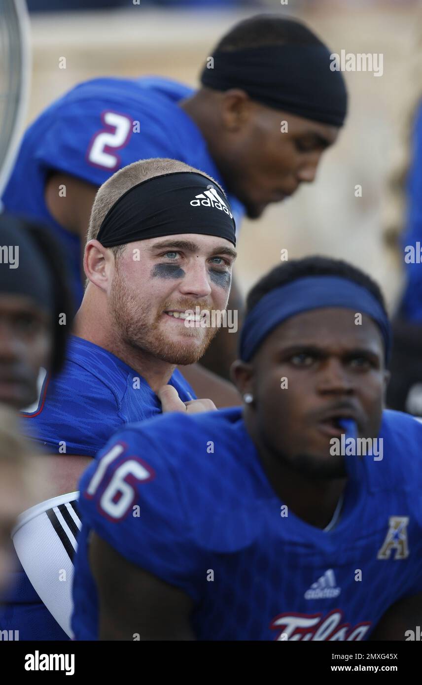 Tulsa quarterback Dane Evans, center, is pictured during an NCAA ...