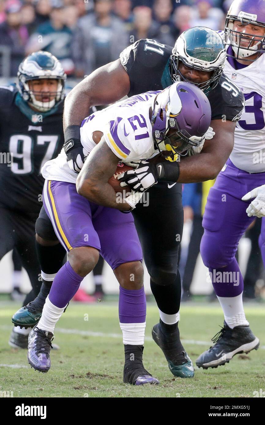 Minnesota Vikings running back Jerick McKinnon (21) gets tackled by ...