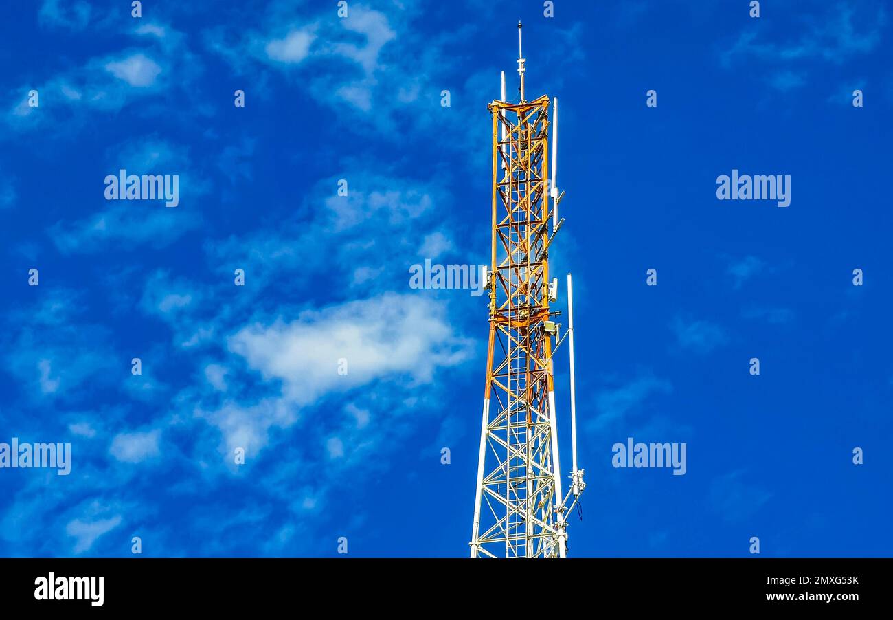 Red white 5G tower with blue sky background radiation kills us in ...