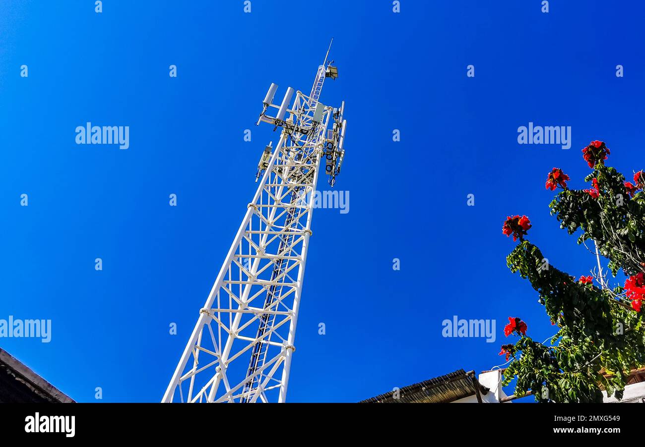 Red white 5G tower with blue sky background radiation kills us in ...