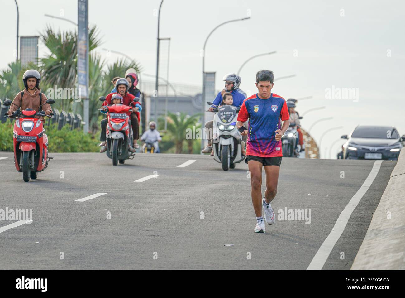 Makassar, South Sulawesi, Indonesia. 3rd Feb, 2023. A man was jogging ...