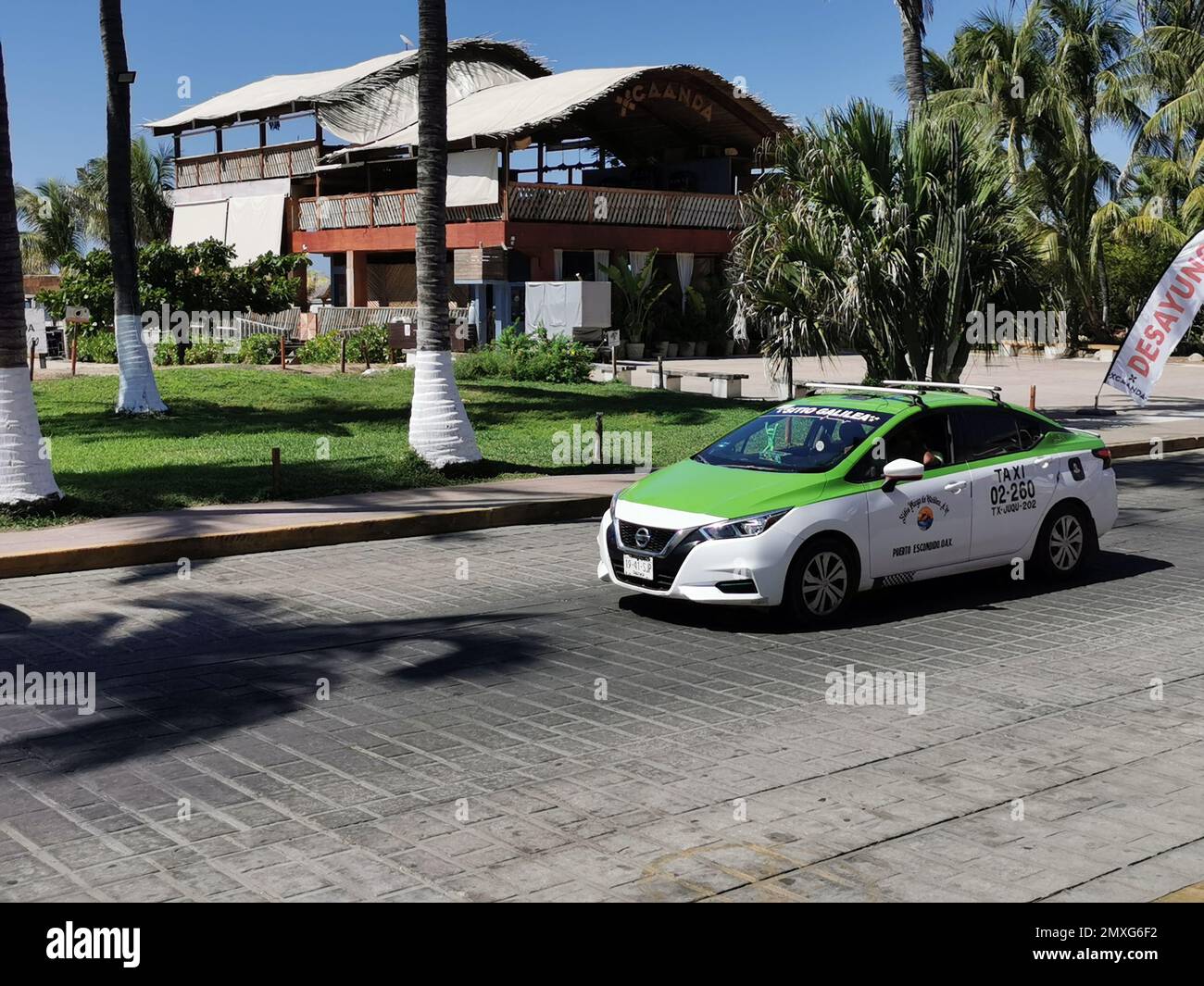 Puerto Escondido Oaxaca Mexico 26. January 2023 Colorful green taxi cab ...