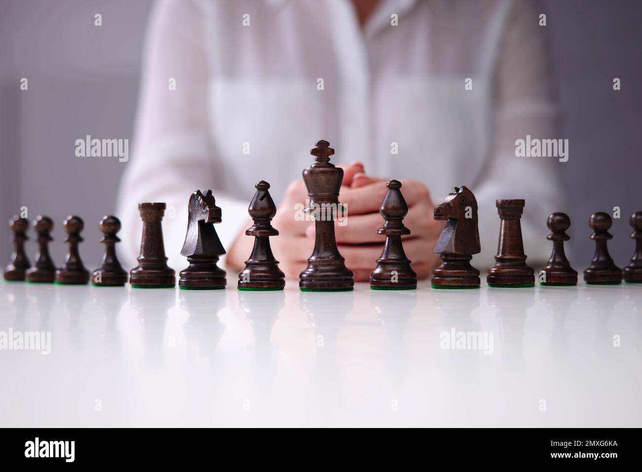 Success Business Strategy. Person With Chess King Stock Photo - Alamy