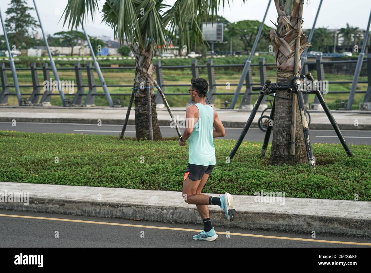 Makassar, South Sulawesi, Indonesia. 3rd Feb, 2023. A man was jogging ...