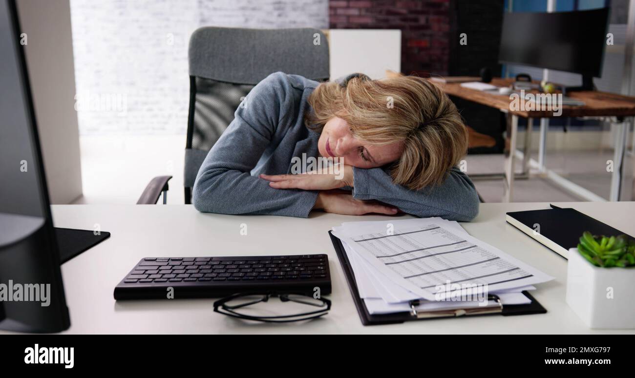Bored Boss Woman Sleeping. Restful Tired Employee Stock Photo - Alamy