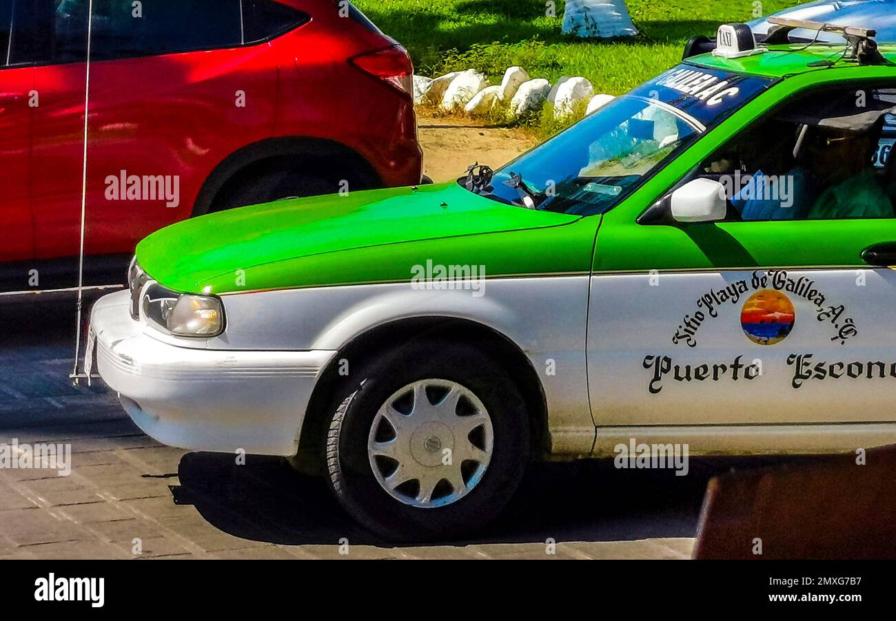 Puerto Escondido Oaxaca Mexico 25. January 2023 Colorful green taxi cab ... Puerto Escondido Oaxaca Mexico 25. January 2023 Colorful green taxi cab ...