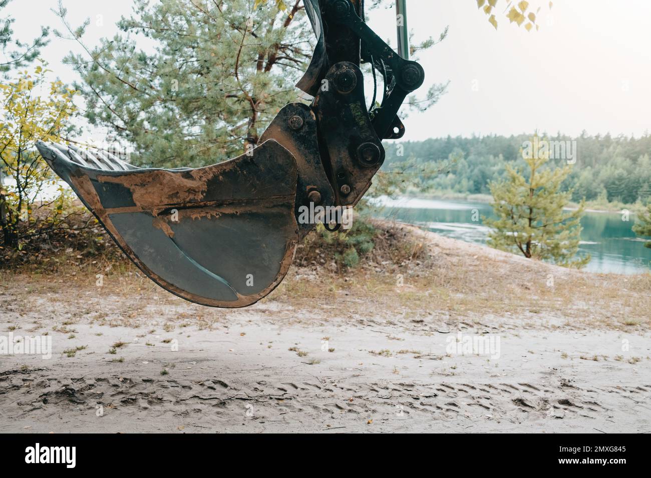 Large bucket on construction site or quarry. Mining heavy machinery ...