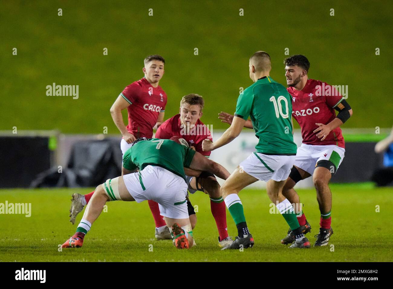 Harri Ackerman #12 is tackled by Ruadhan Quinn #7 of Ireland U20's ...