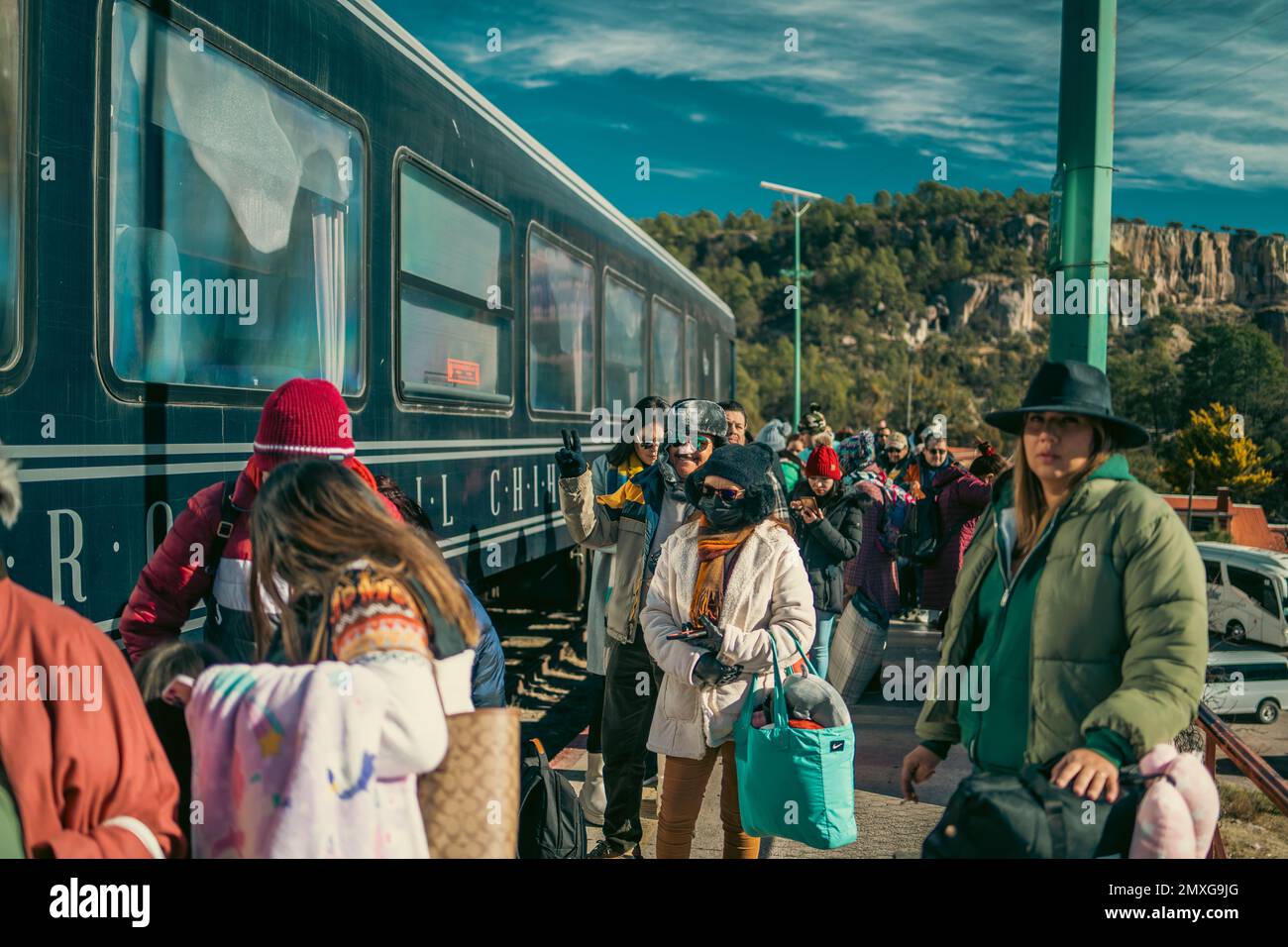 A group of people getting off the Train Chepe Express in Mexico on a ...
