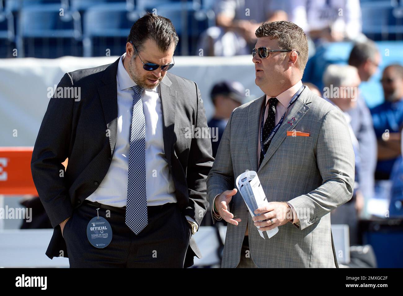 Indianapolis Colts general manager Ryan Grigson, left, talks with ...