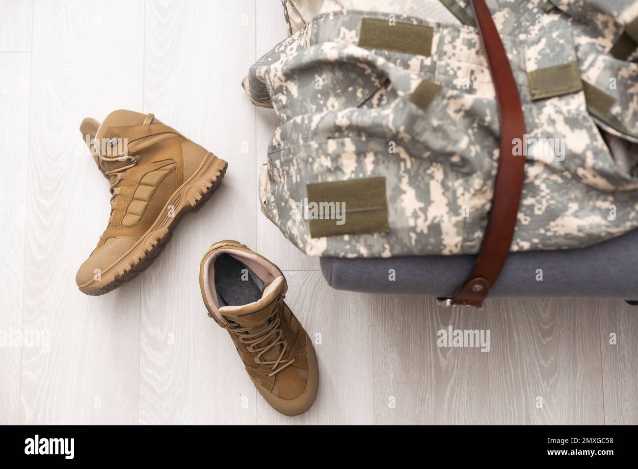 military camouflage uniforms and boots Stock Photo - Alamy